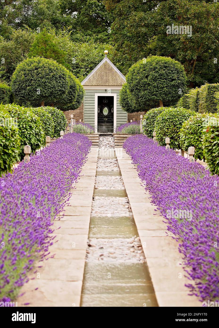 Lavender borders, garden path and pergola in English garden Stock Photo ...