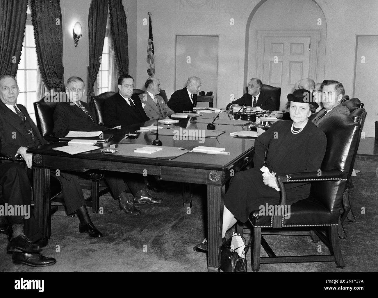 President Franklin Roosevelt, chairing a meeting at center of table ...