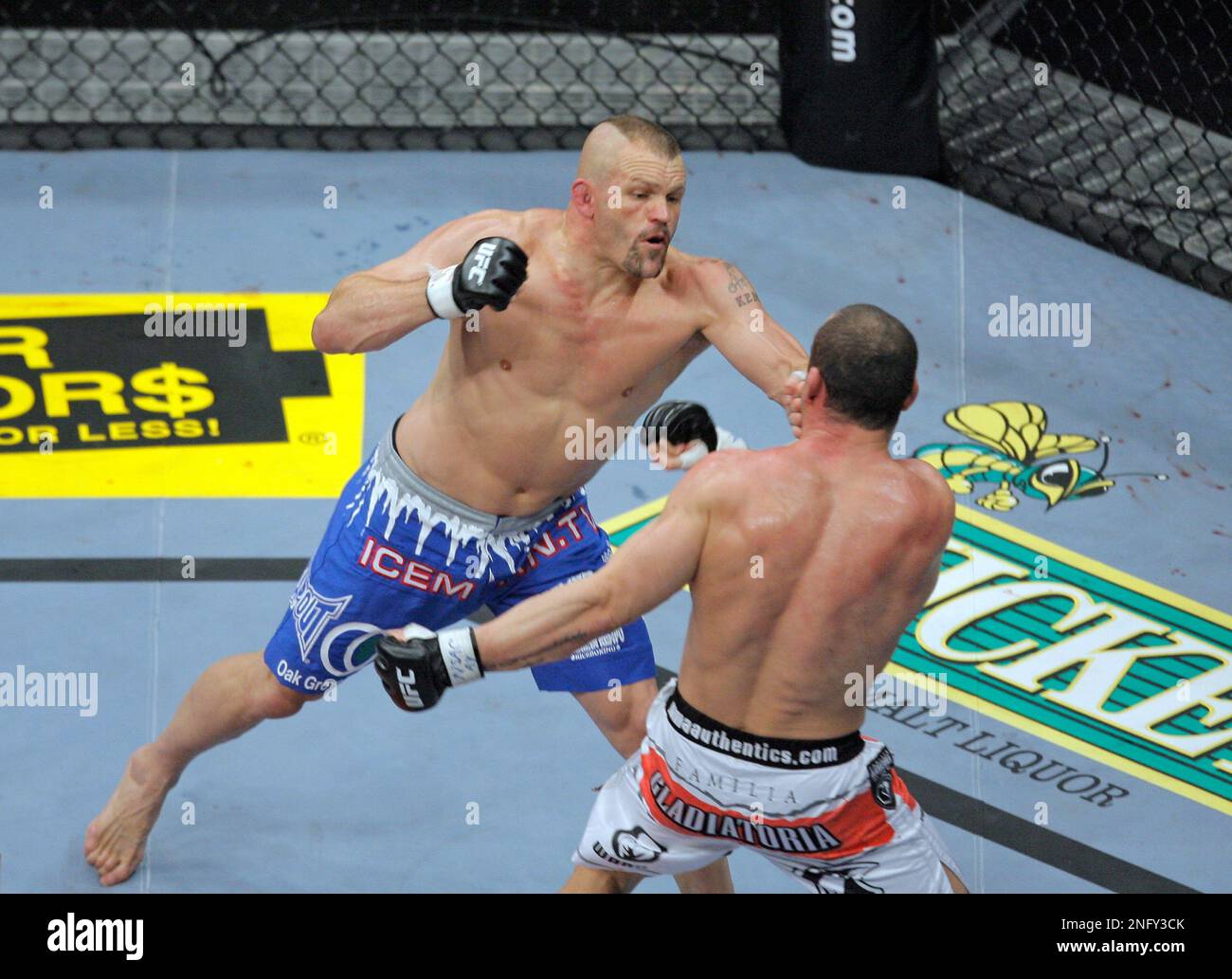 Chuck Liddell, left, throws a punch against Wanderlei Silva, of Brazil ...