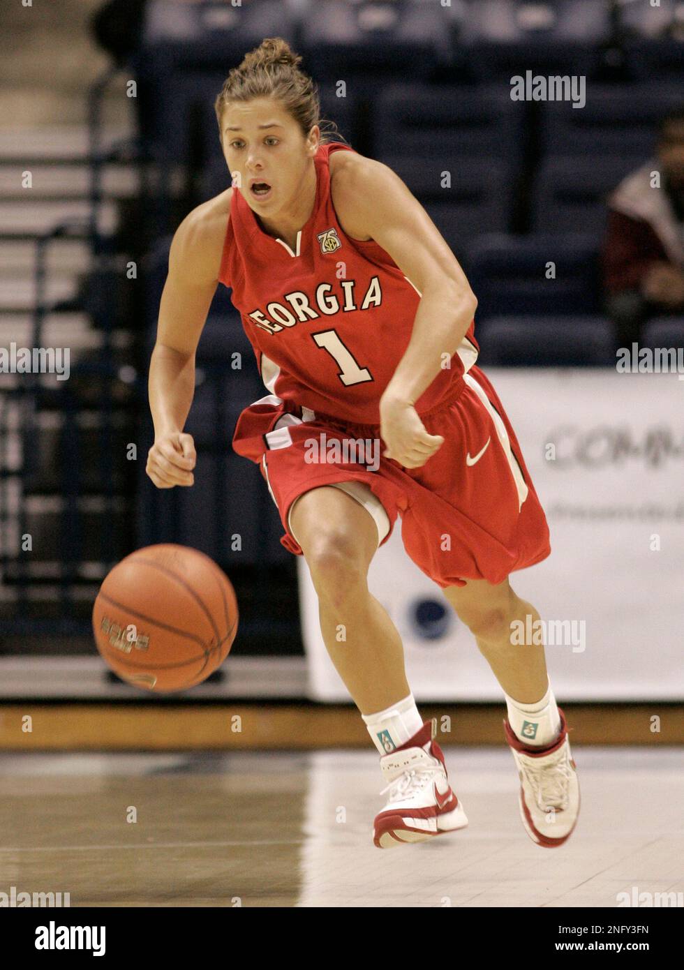 Georgia guard Ashley Houts brings the ball up court against Xavier in a ...