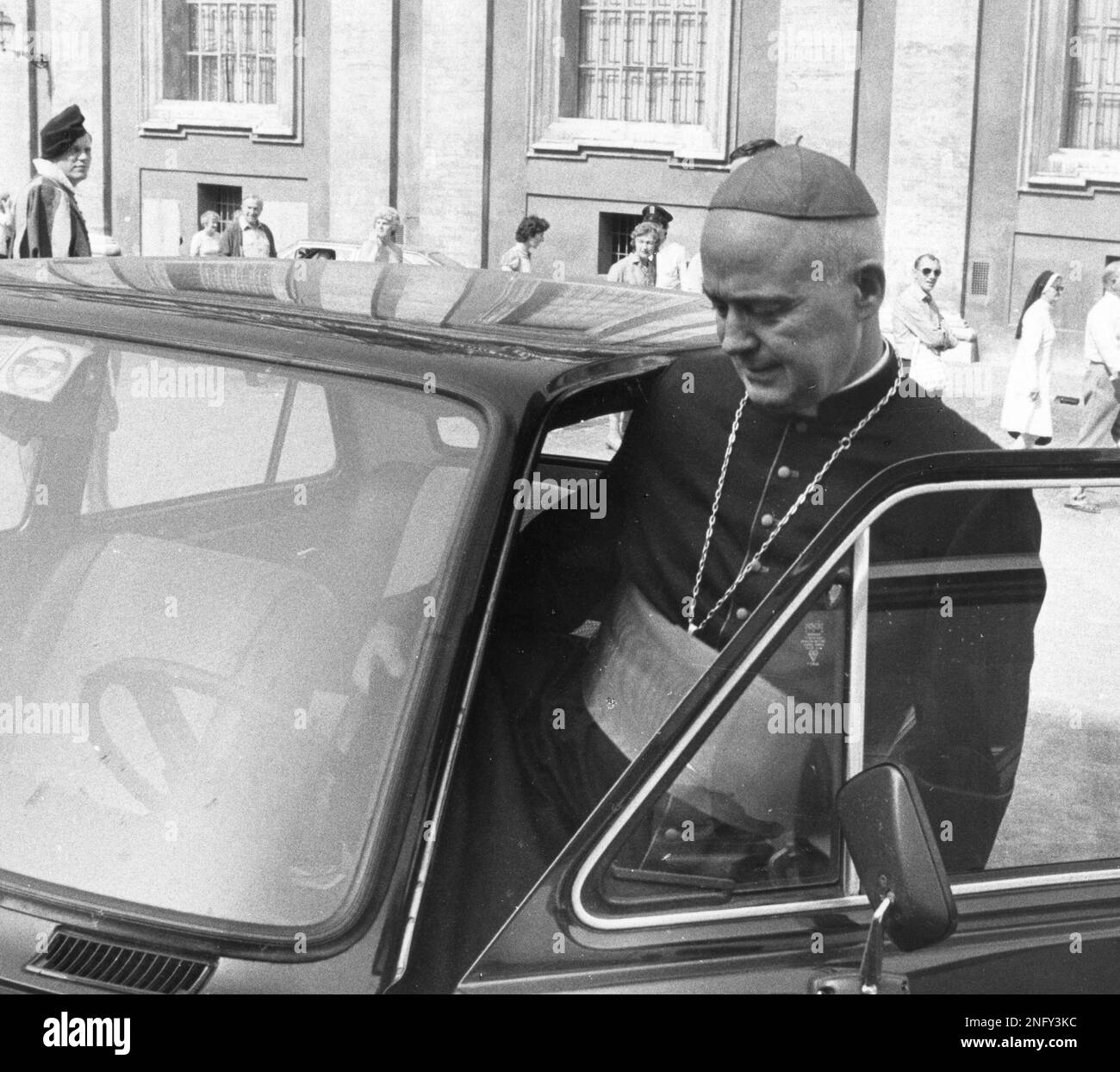 Cardinal Giovanni Benelli, archbishop of Florence, gets in his car at ...