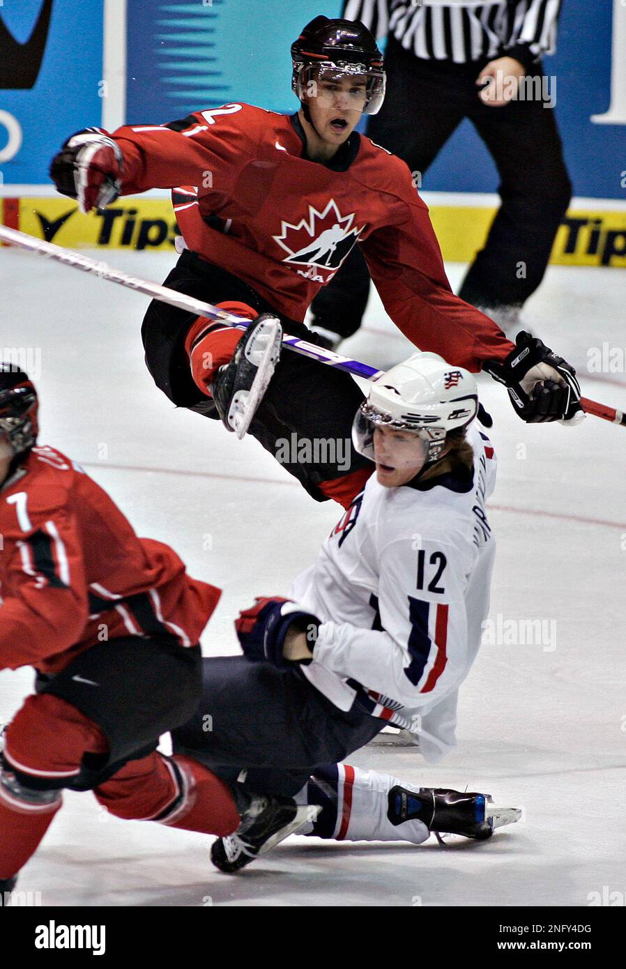 Team Canada Brandon Sutter, of Red Deer, Alta., and Team USA James van ...