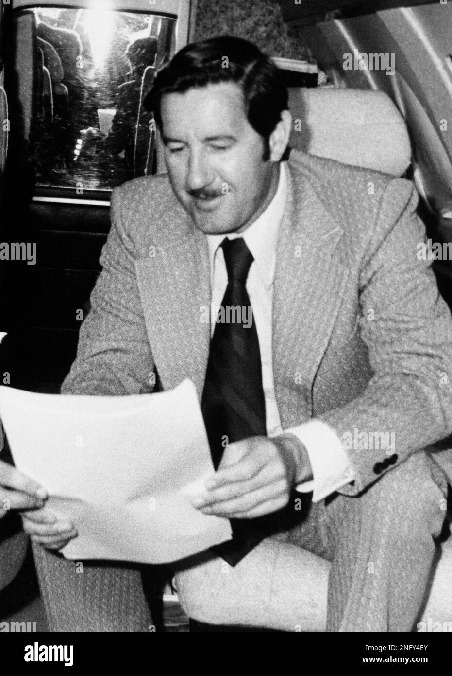 Financier Robert Vesco sits aboard his jet flying over San Jose, Costa ...