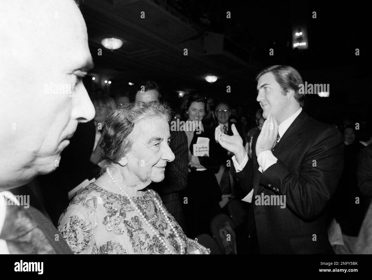 The audience gives former Israeli Prime minister Golda Meir a standing ...