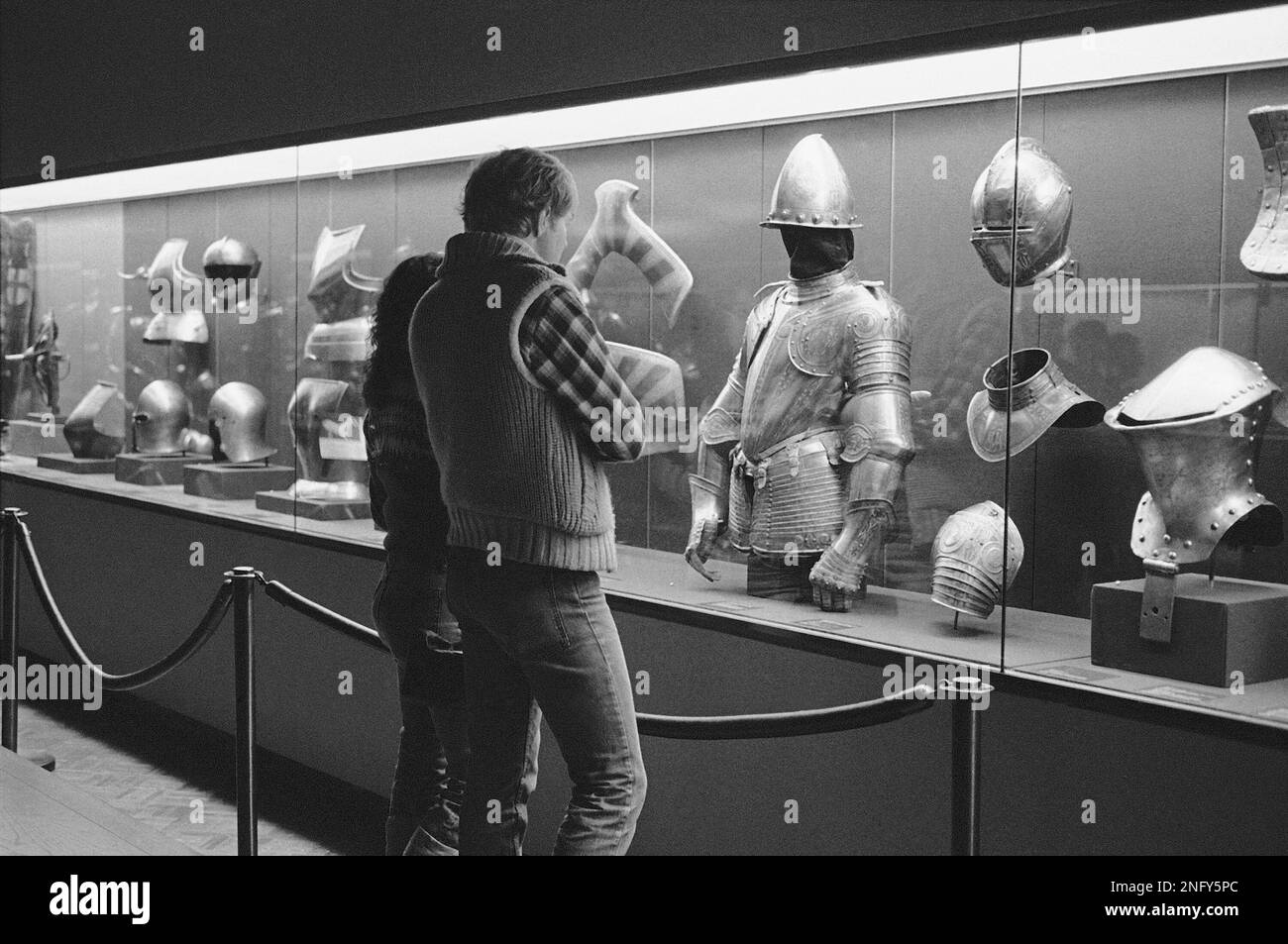A couple stops to look at pieces of armor from a selection of 205 ...