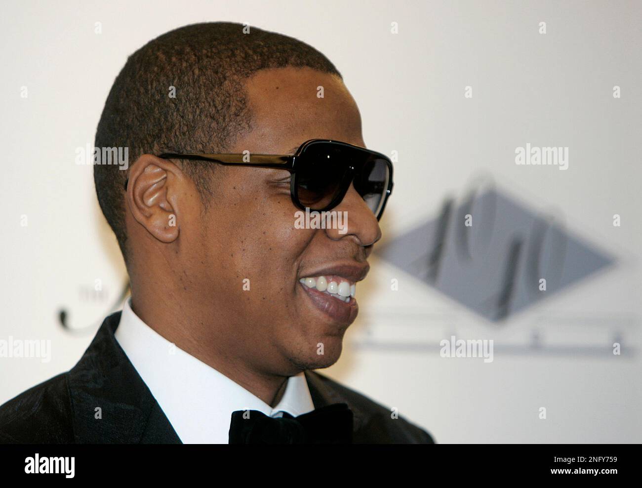 Rapper Jay-Z arrives at the grand opening of his 40/40 Club at the ...