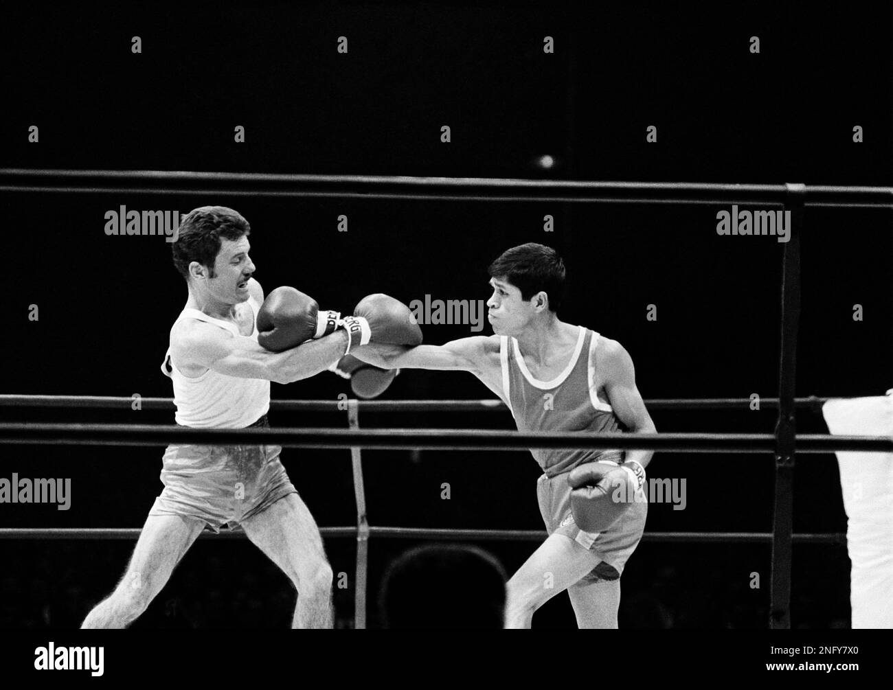 Richard Delgado of Mexico trades blows with Artur Olech of Poland ...