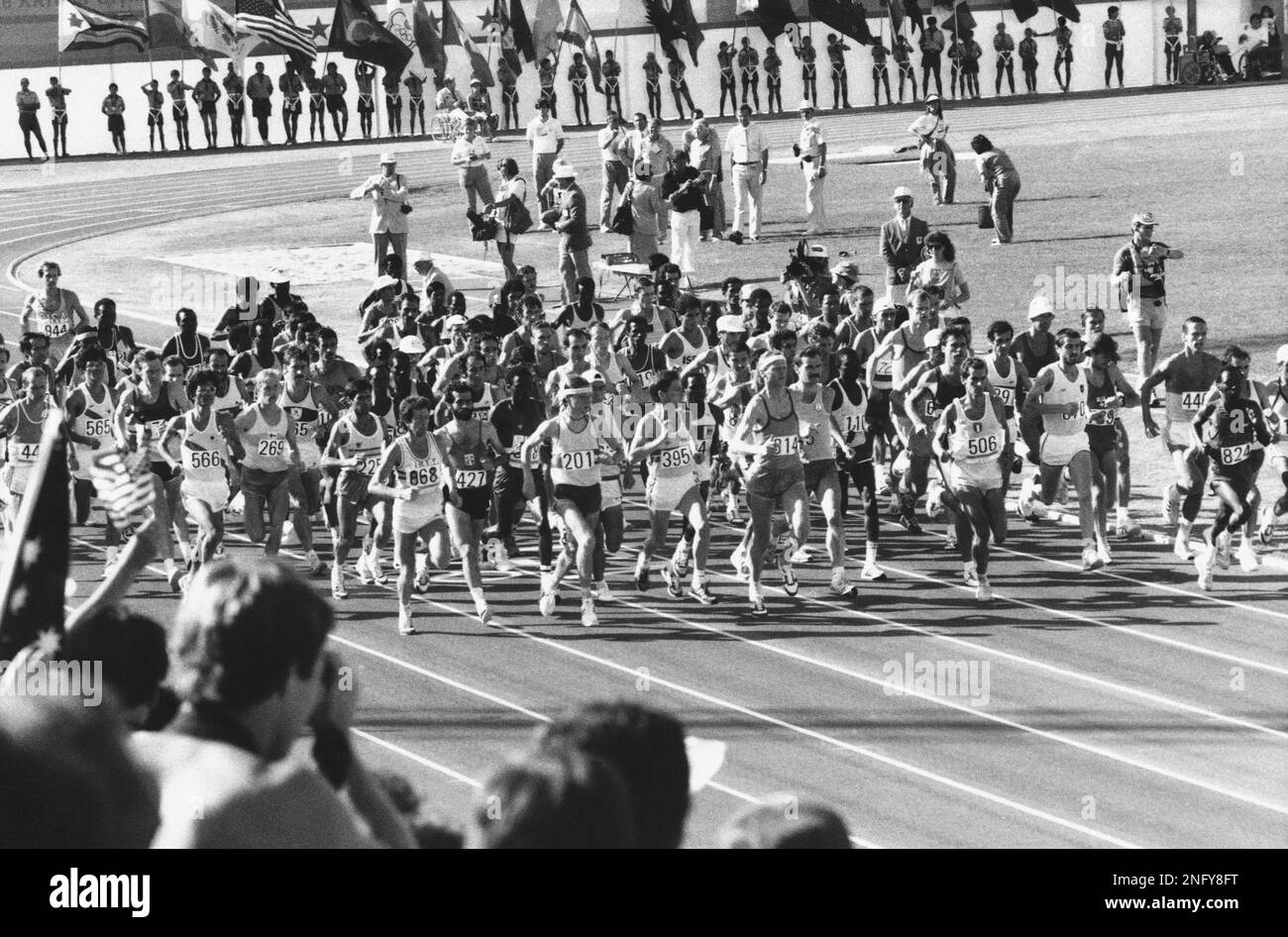 Marathon runners jam the street as they participate in the Olympic run ...