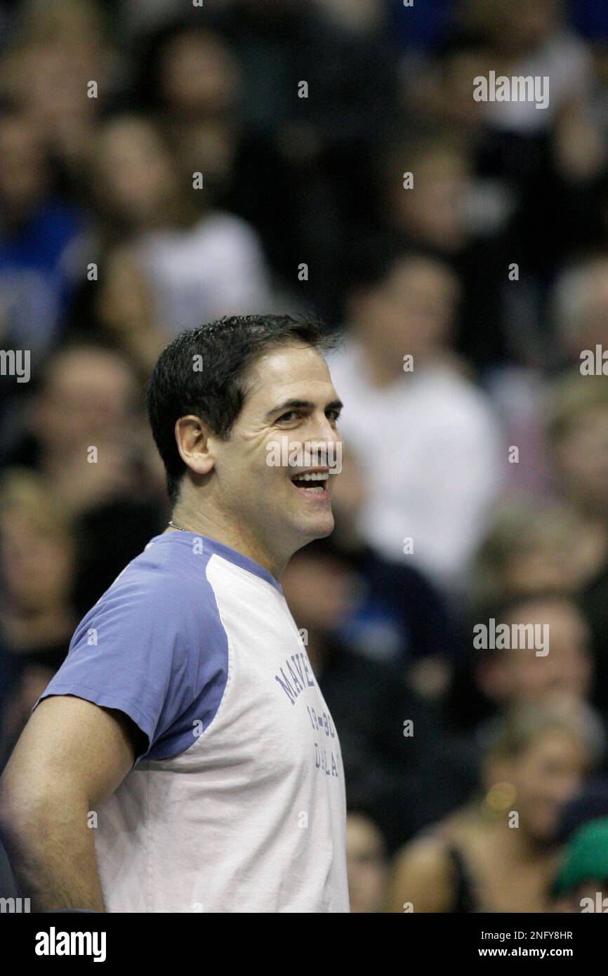Dallas Mavericks owner Mark Cuban smiles during an NBA basketball game ...