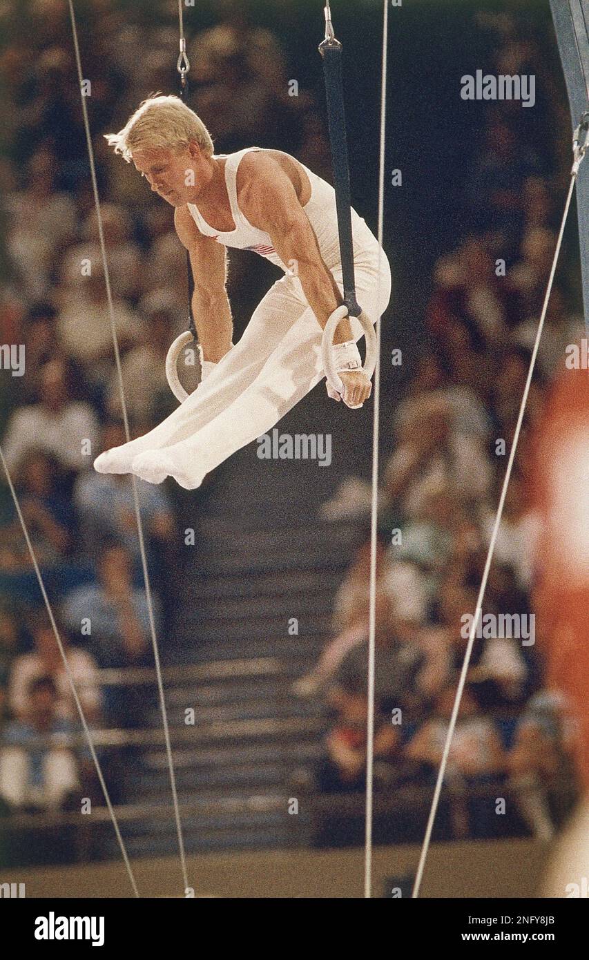 American gymnast Bart Connor performs on the rings during the ...