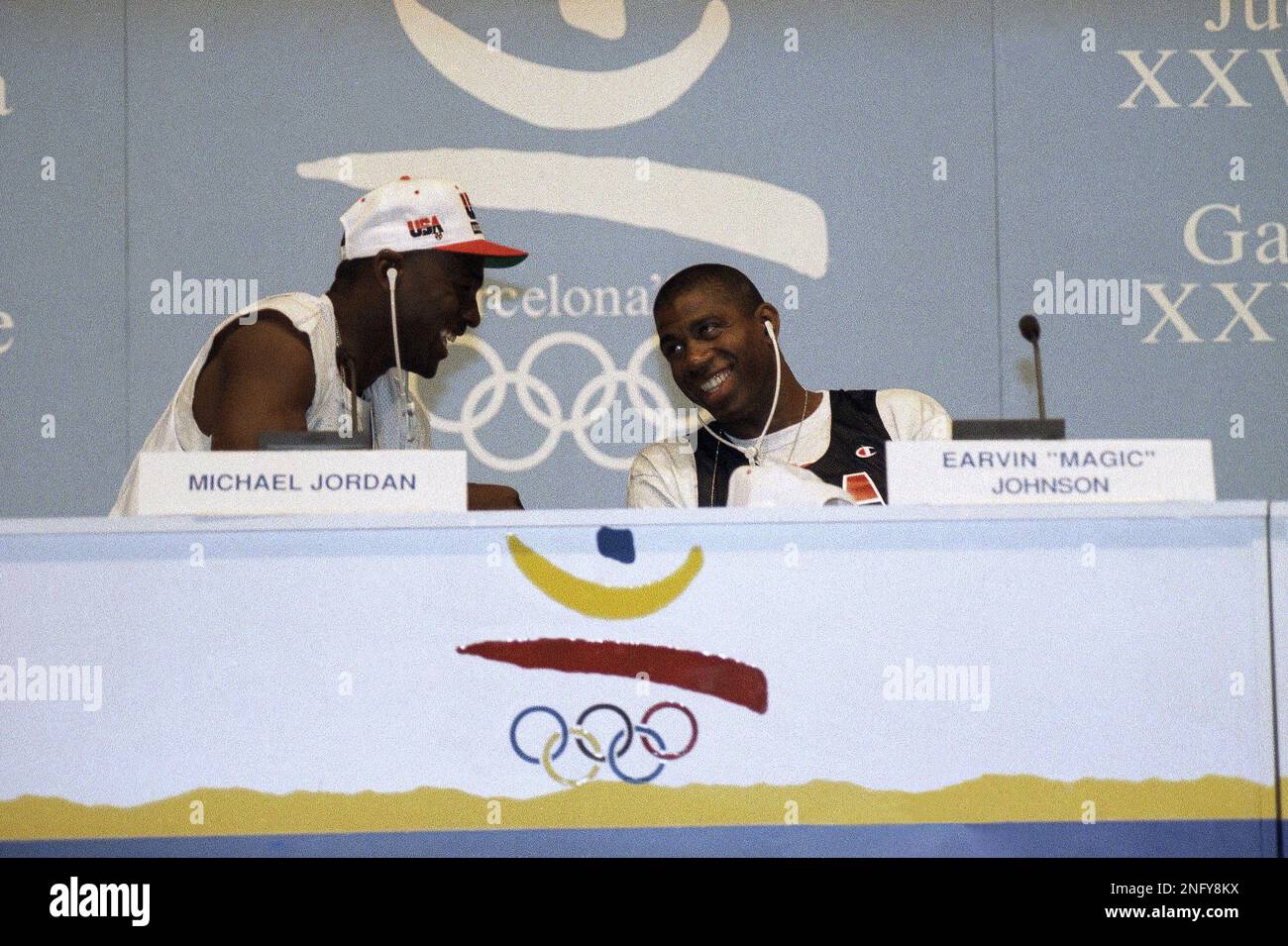Michael Jordan, left, and Earvin "Magic" Johnson share a light moment ...