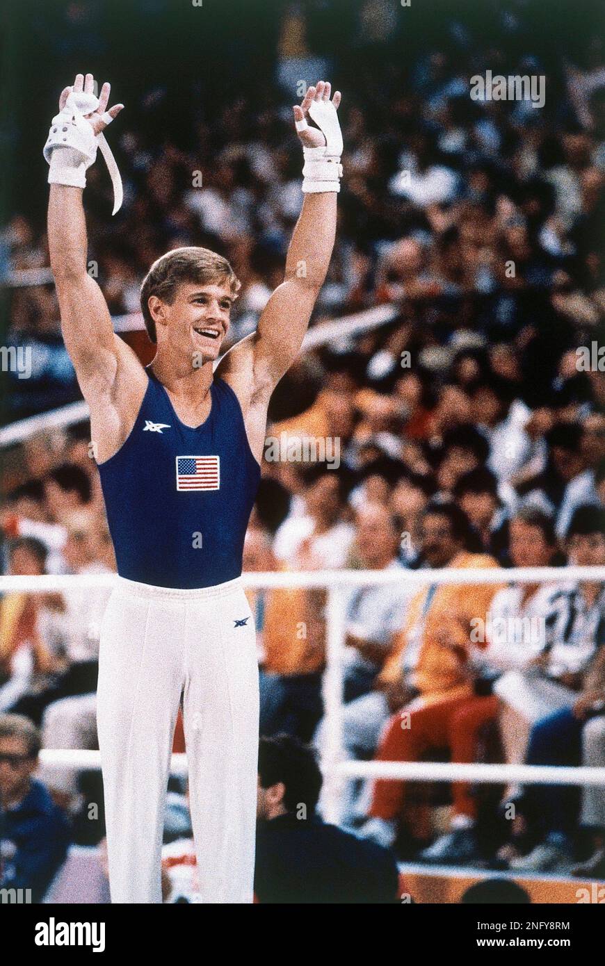 American gymnast Peter Vidmar, celebrates his perfect score of 10 on ...