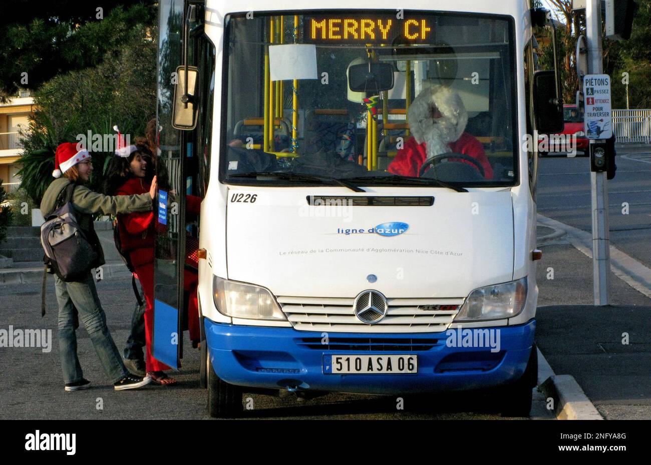 School bus driver Herve Gerard, dressed as Santa Claus, surprises ...