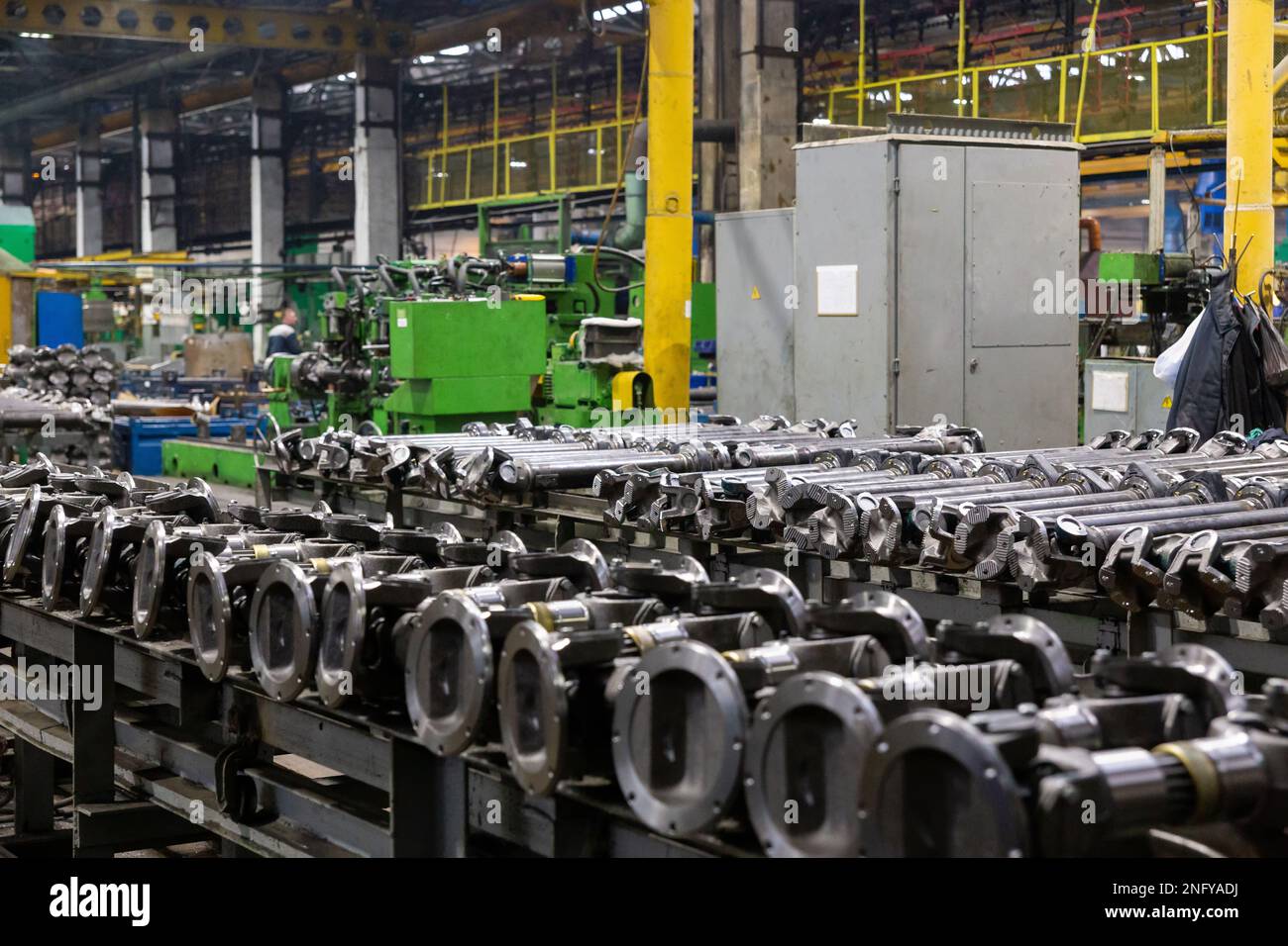 Cardan shafts and gimbal transmissions moving on conveyor during ...