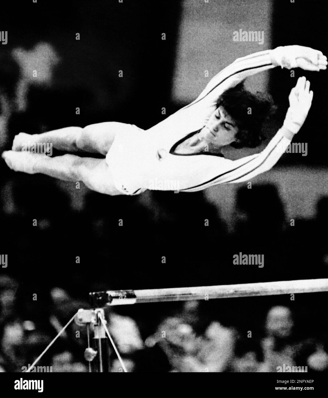 Romania's Nadia Comaneci during her performance on the uneven bars that ...