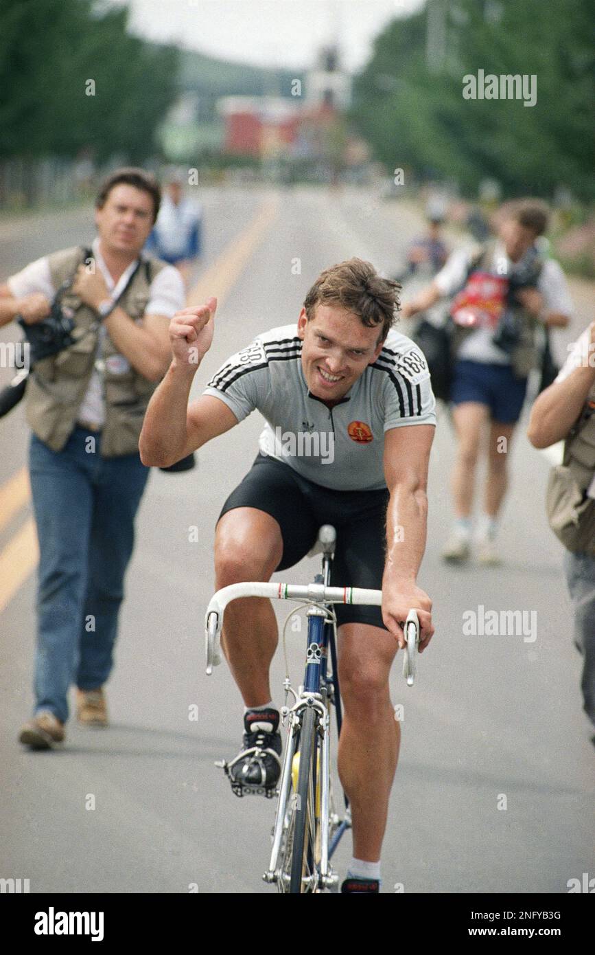 East Germany's Olaf Ludwig smiles and gives the thumbs up after winning ...