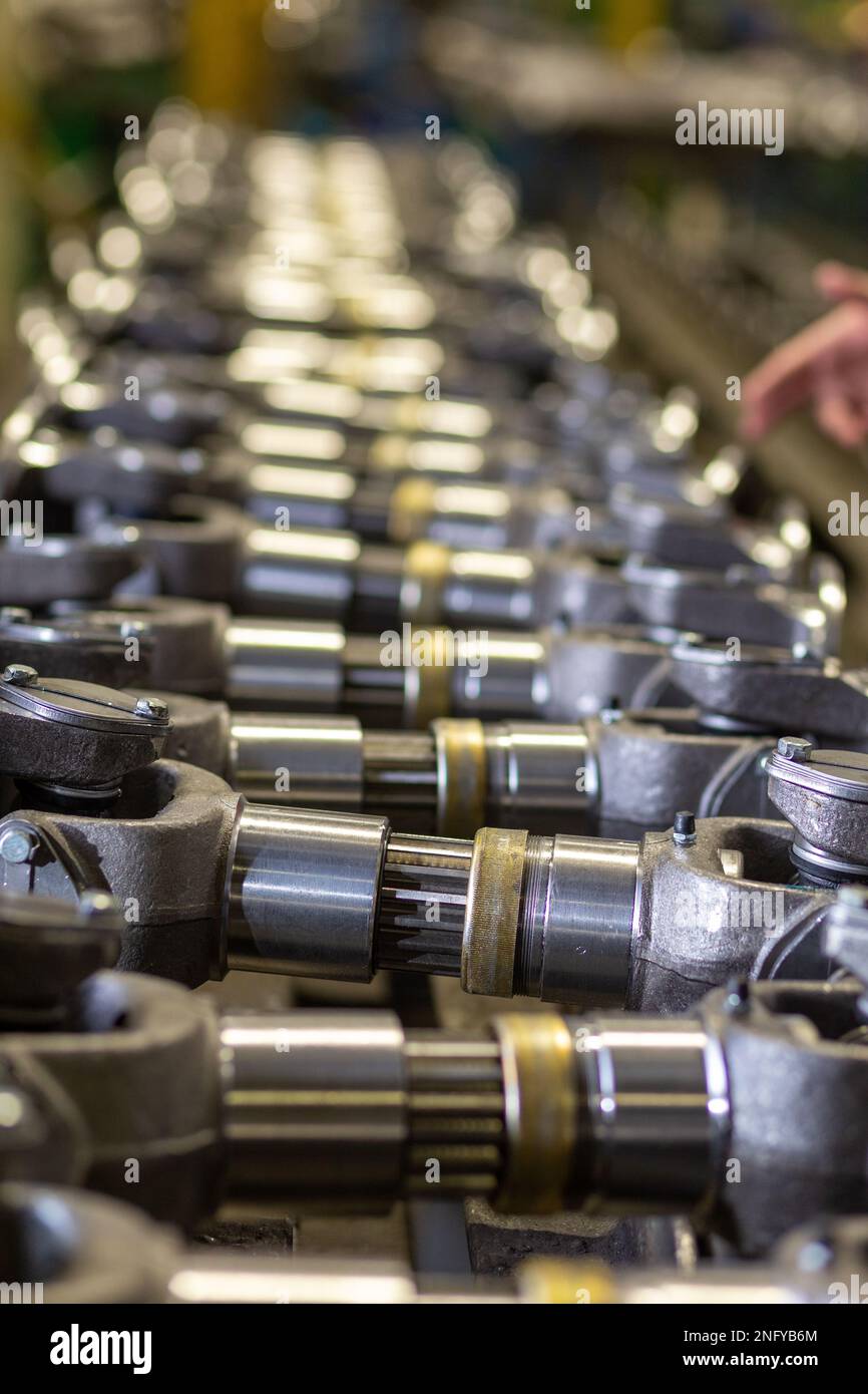 Cardan shafts and gimbal transmissions moving on conveyor during ...