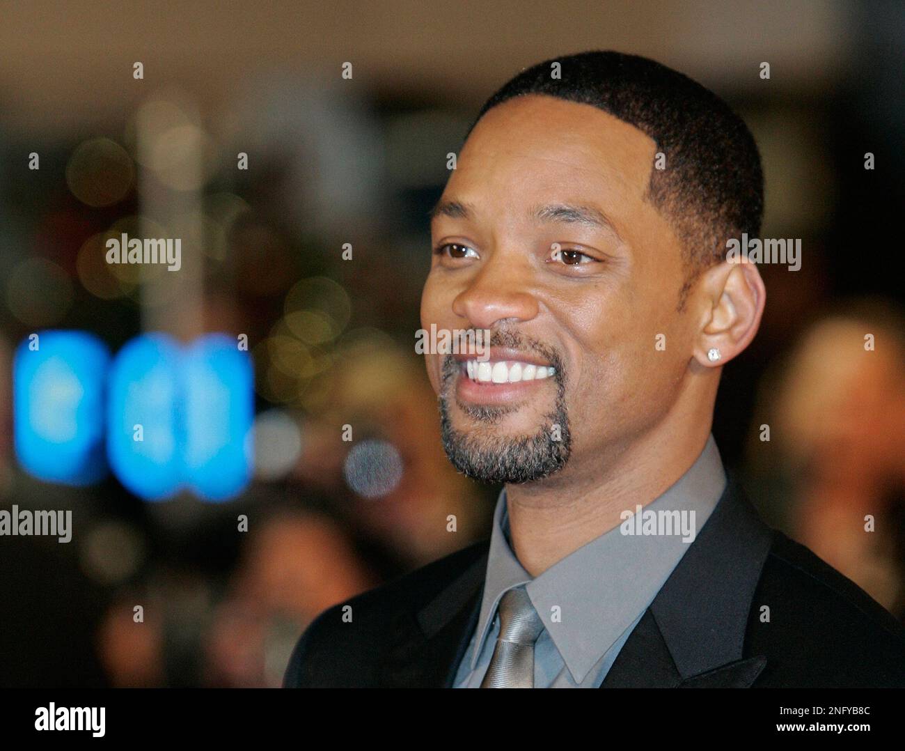 U.S. actor Will Smith poses for the photographers as he arrives for the ...