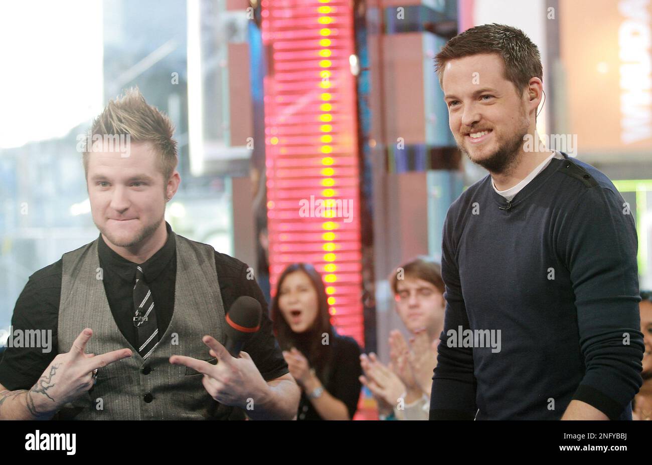 Singer Blake Lewis, left, chats with VJ Damien Fahey during an ...