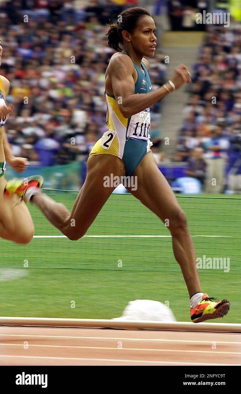 Australian sprinter Cathy Freeman competes in a heat of the first round ...