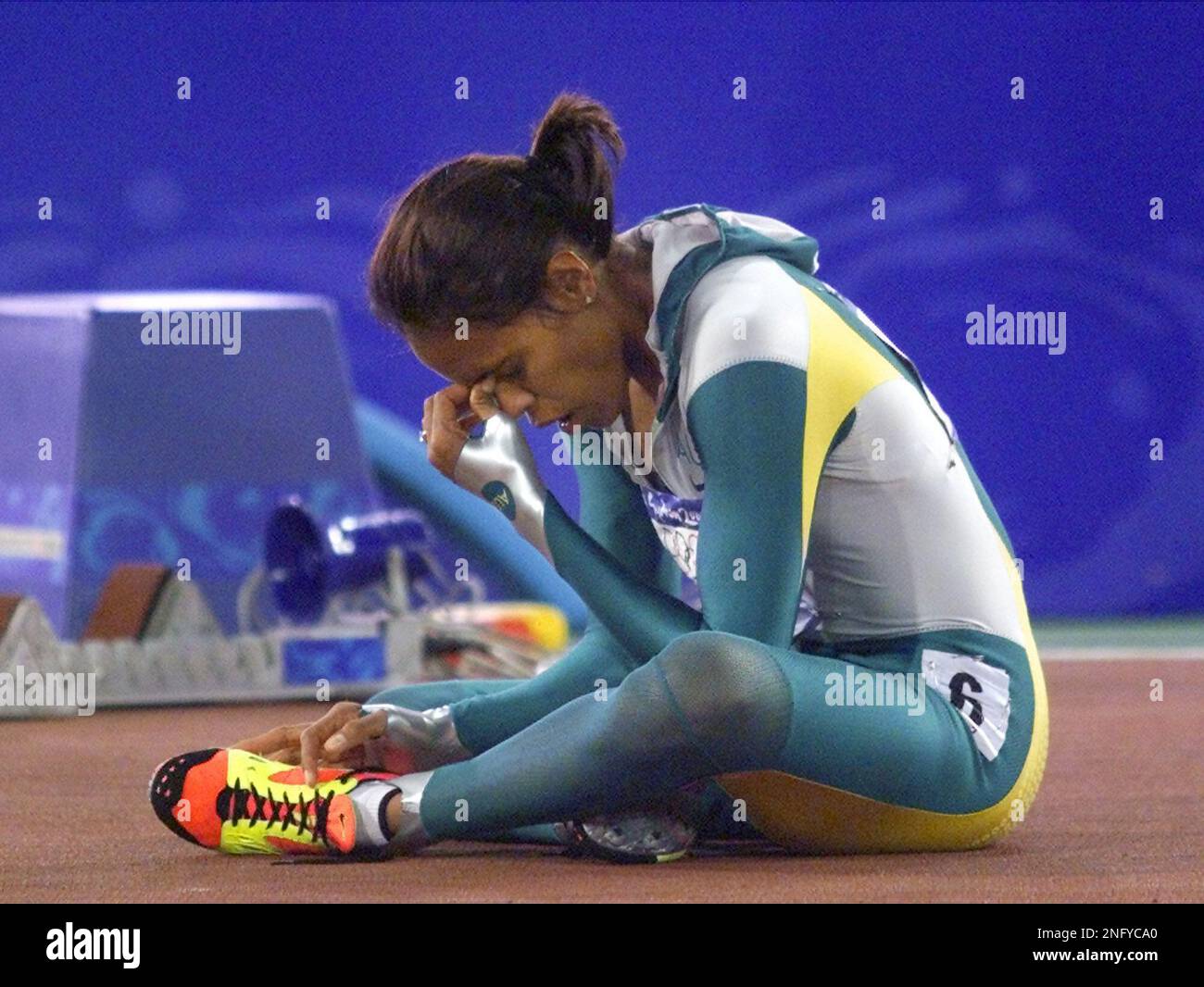 Australia's Cathy Freeman reacts after winning the gold medal in the ...