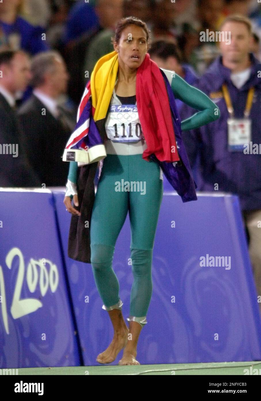 Australia's Cathy Freeman walks off the field after winning the gold ...