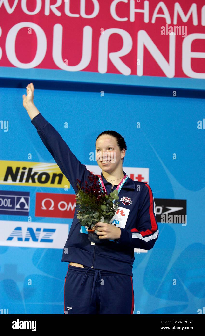 Gold medalist USA's Kate Ziegler smiles with her medal during a medal ...