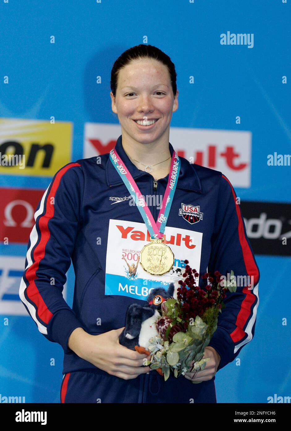 Gold medalist USA's Kate Ziegler smiles with her medal during a medal ...