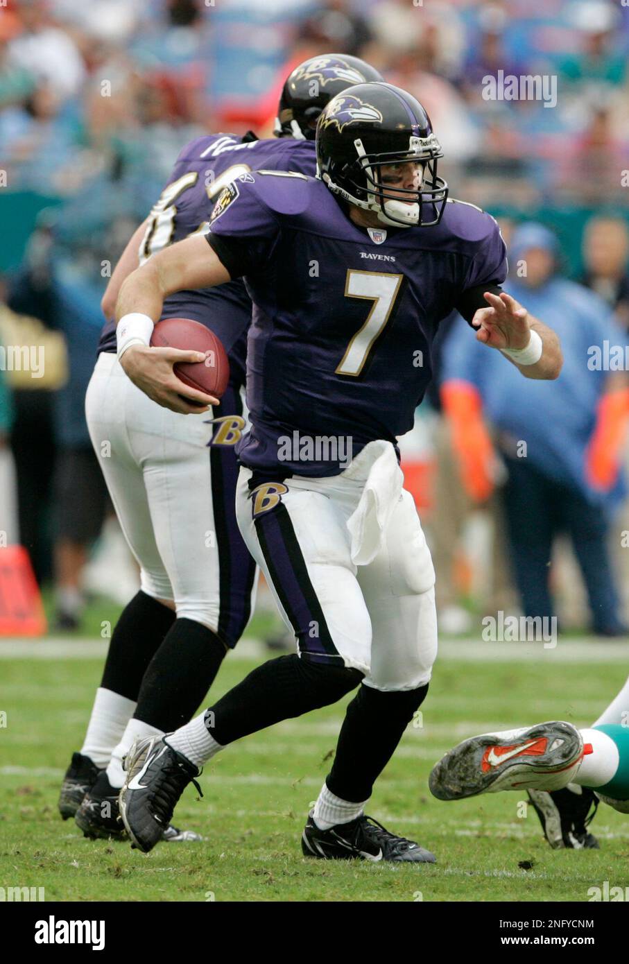 Baltimore Ravens quarterback Kyle Boller runs with the football during ...