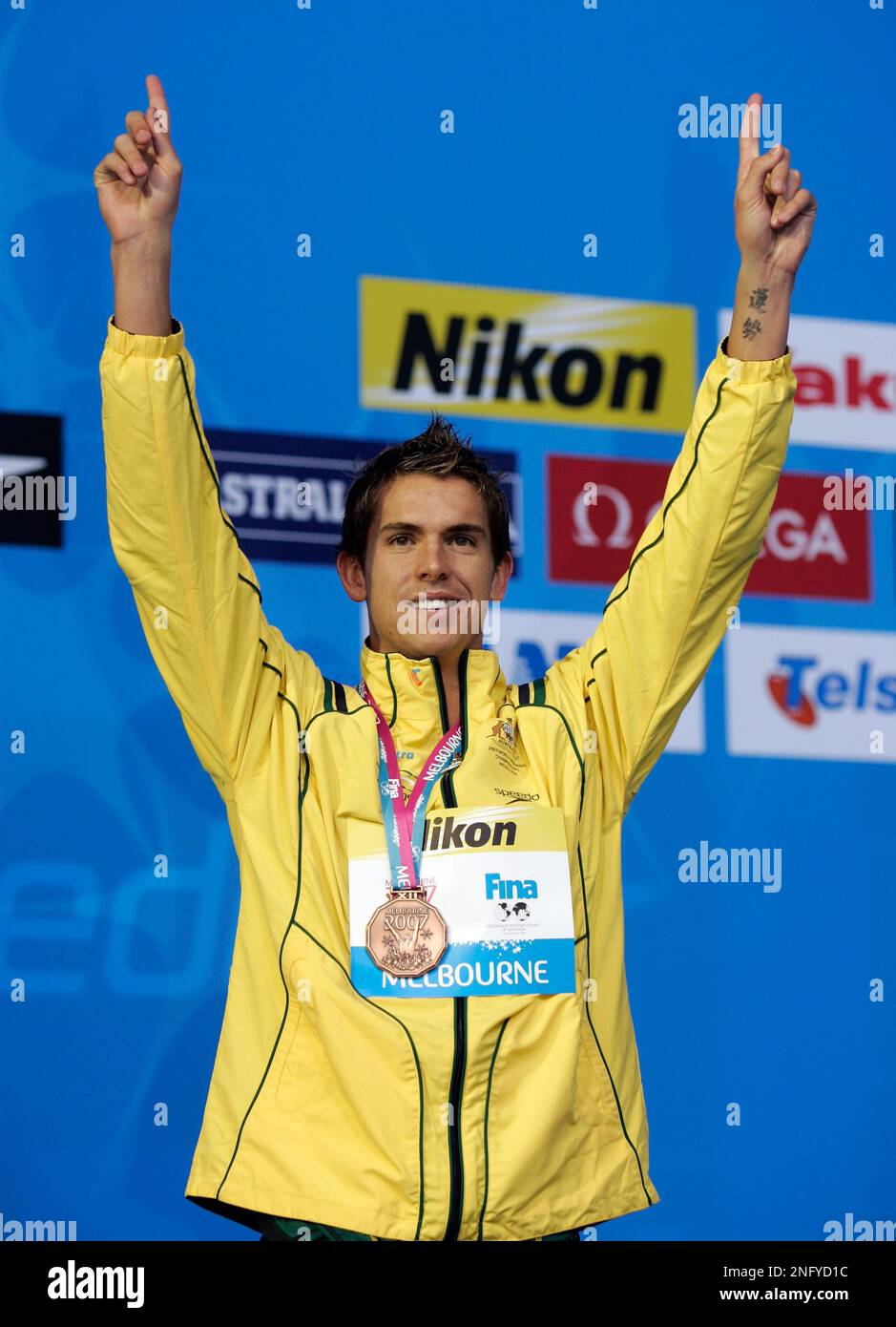 Australia's Eamon Sullivan displays his bronze medal during a medal ...