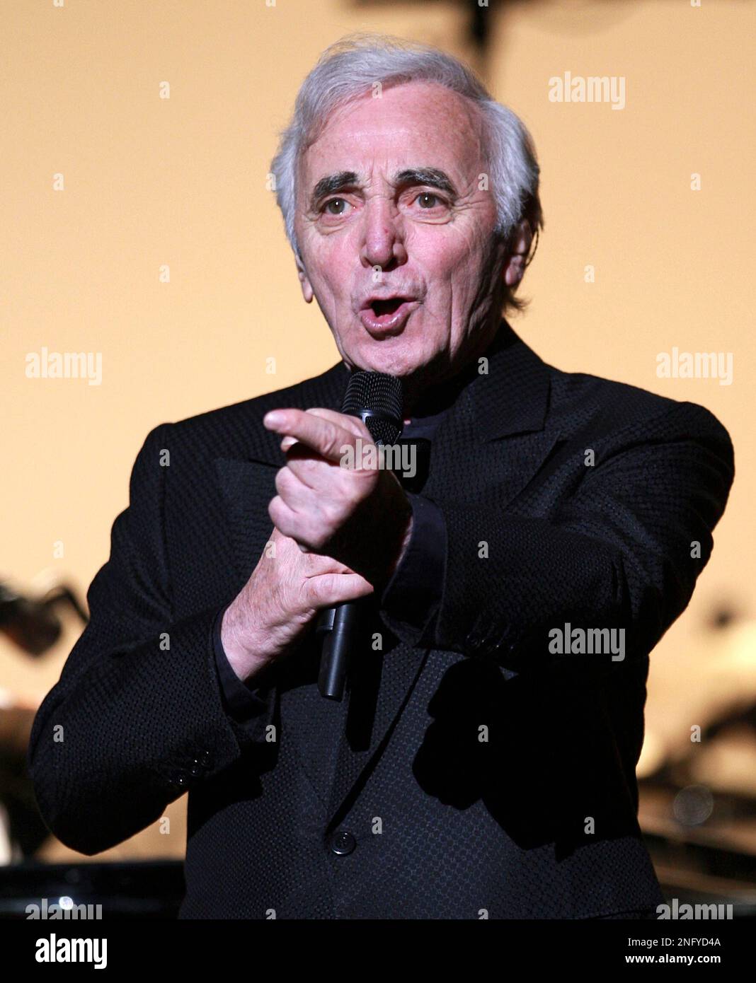 Charles Aznavour, a French singer of Armenian origin, performs during a ...