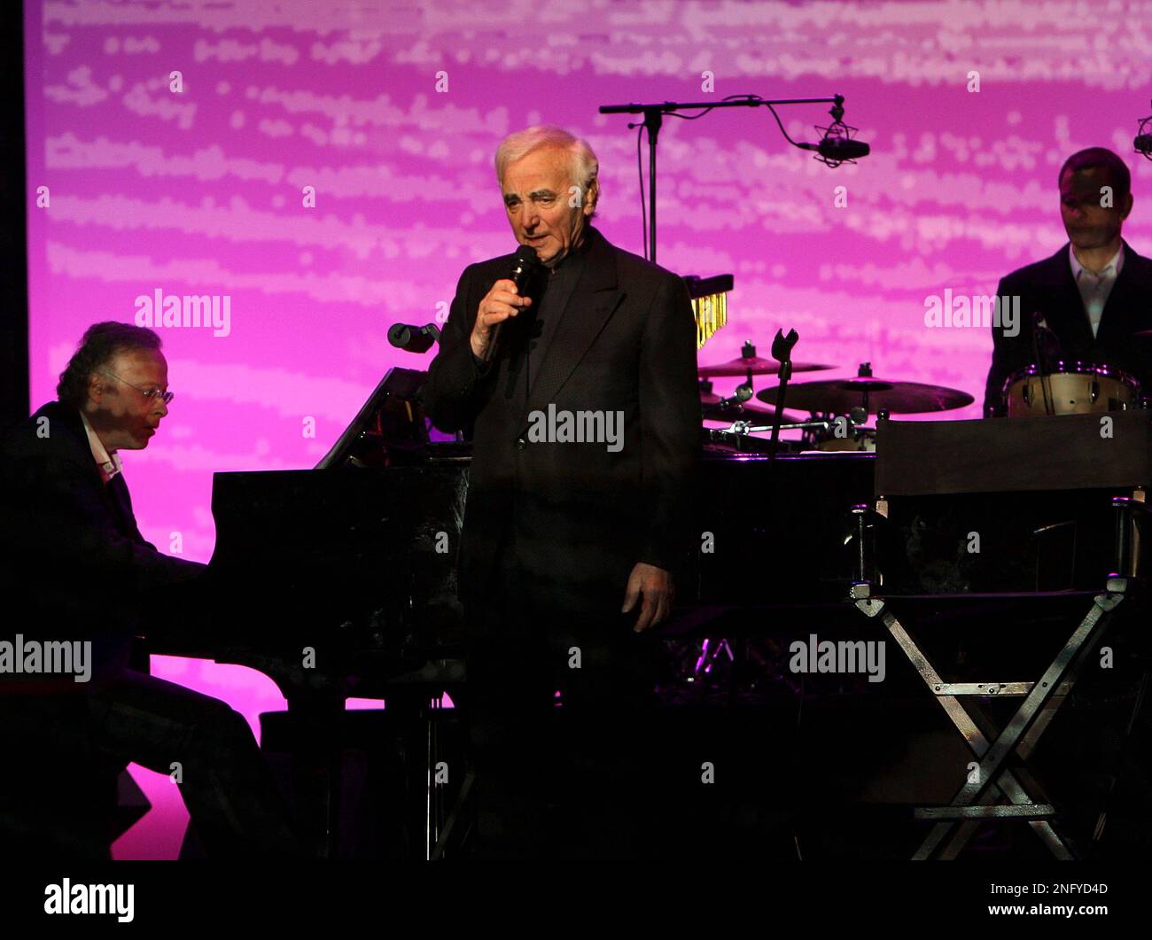 Charles Aznavour, center, a French singer of Armenian origin, performs ...