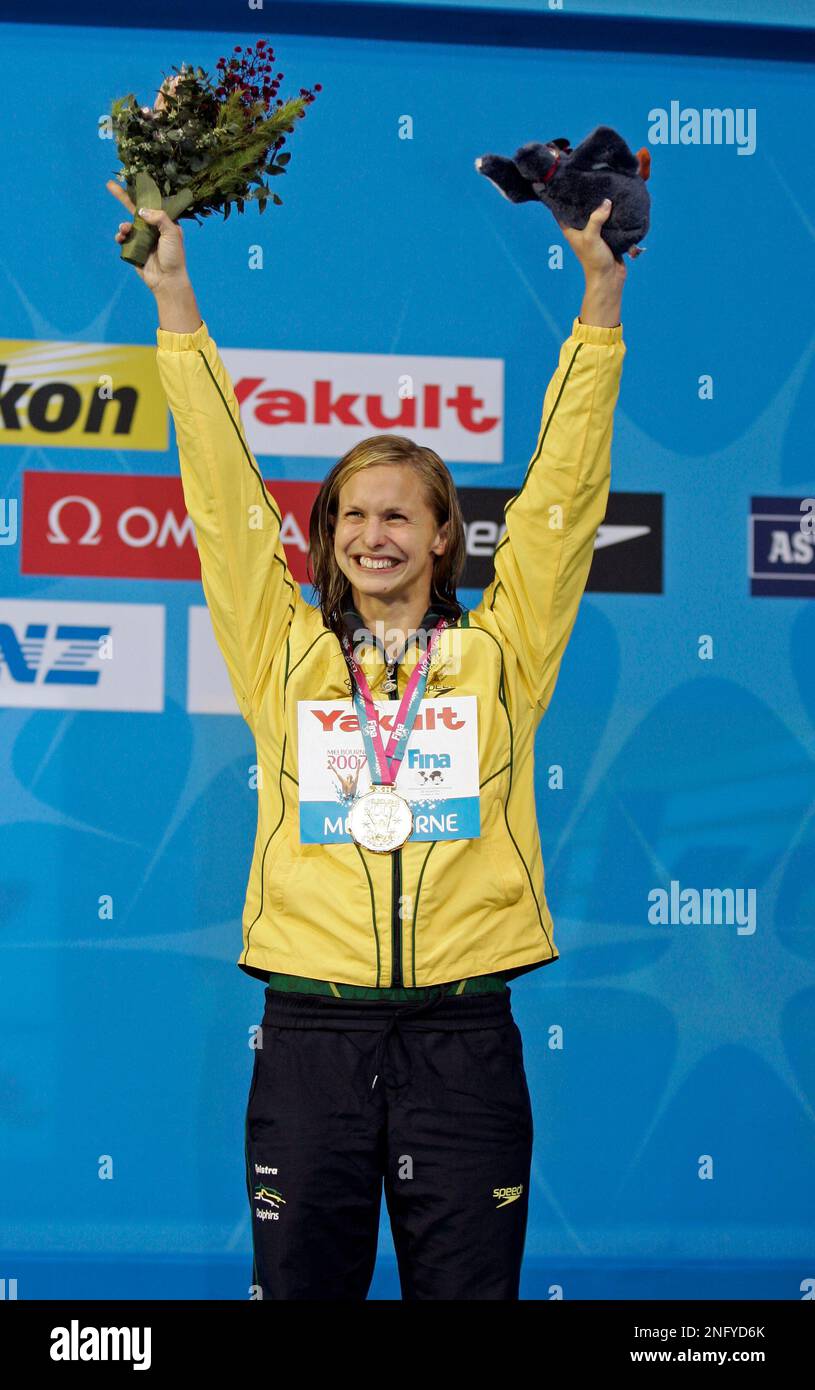 Australia's Libby Lenton is awarded the gold medal for the women's 100m ...