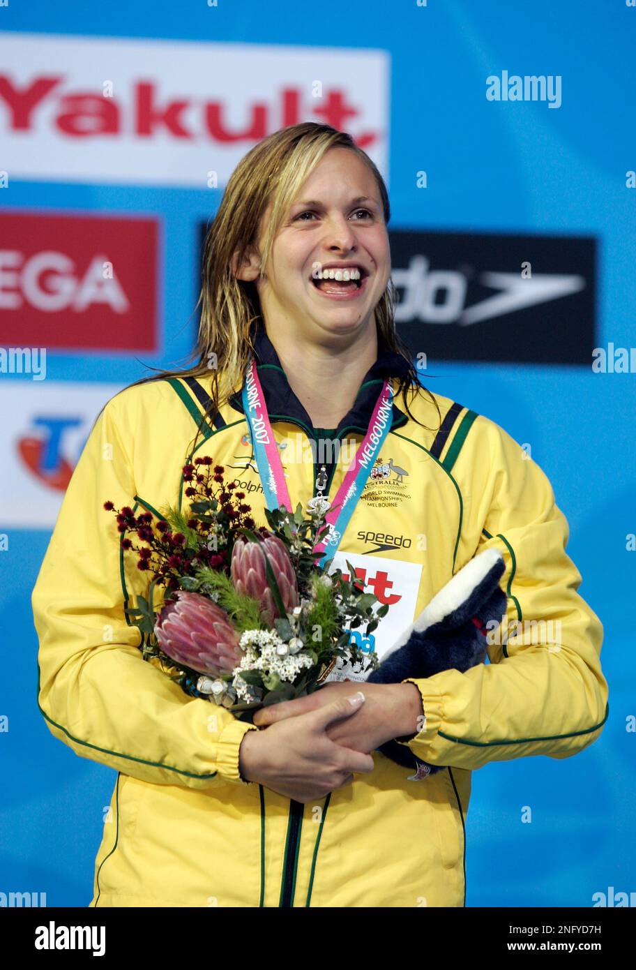Australia's Libby Lenton is awarded the gold medal for the women's 100m ...
