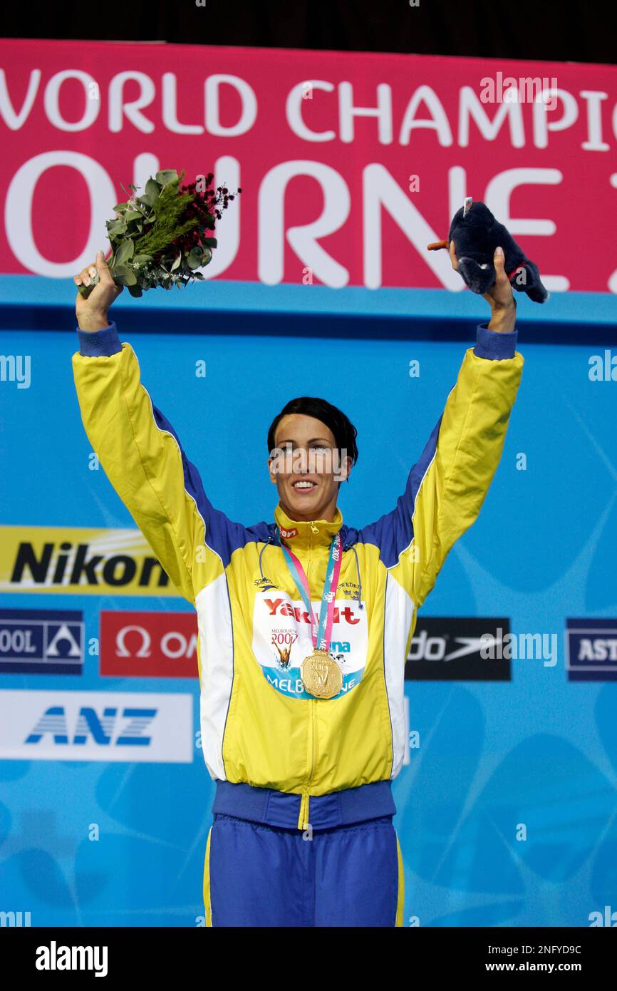 Sweden's Therese Alshammar smiles with her gold medal during a medal ...