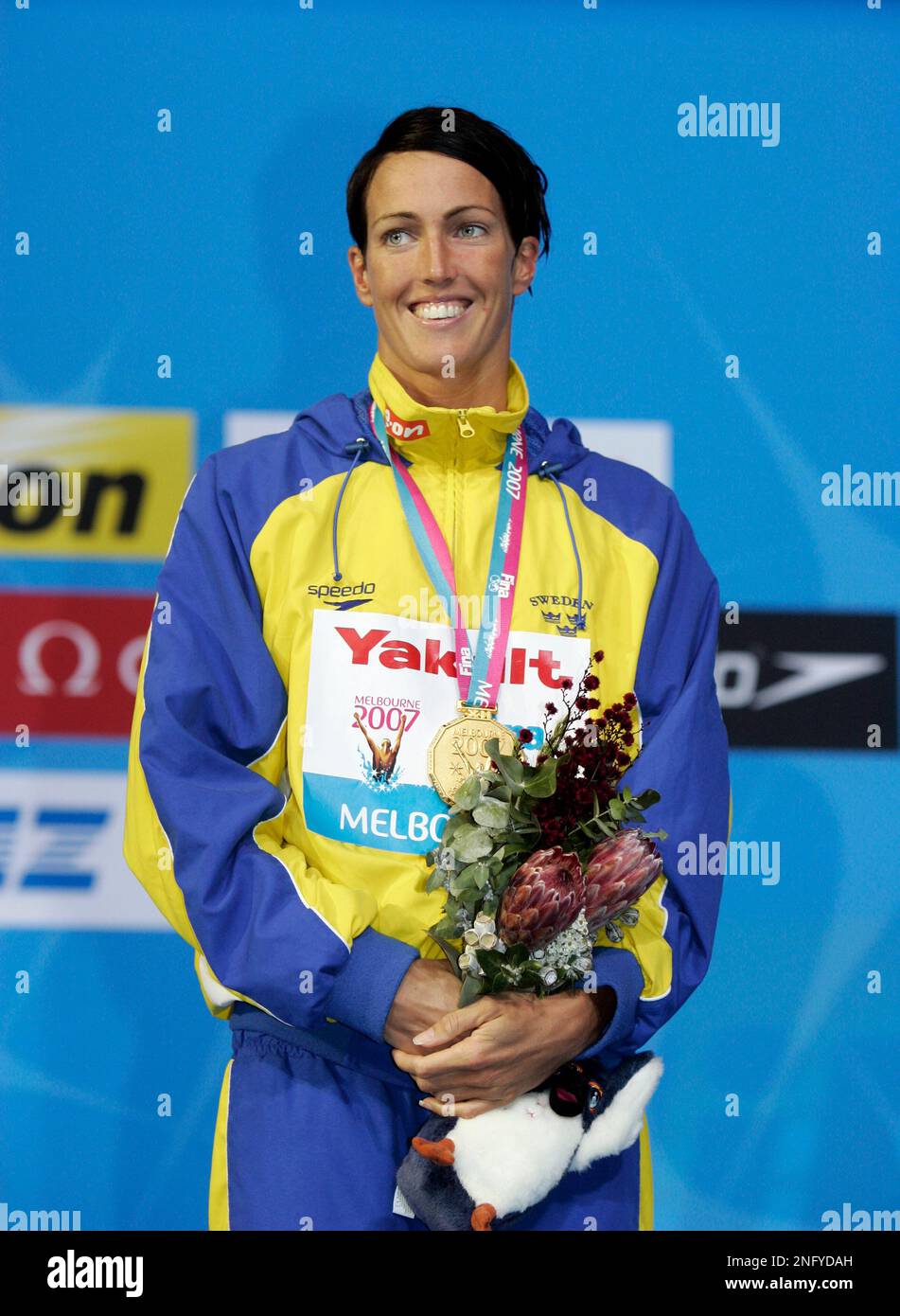 Sweden's Therese Alshammar smiles with her gold medal during a medal ...