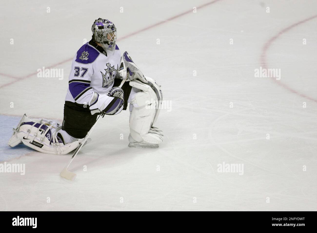 Los Angeles Kings goalie Jean-Sebastien Aubin stretches during a hockey ...