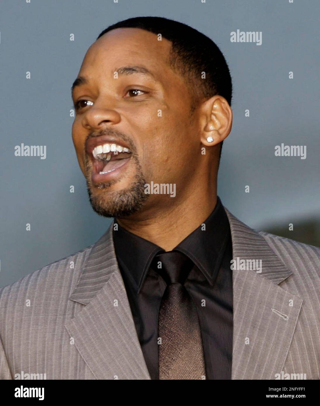 Actor Will Smith, star of "I Am Legend," is seen at his hand and ...