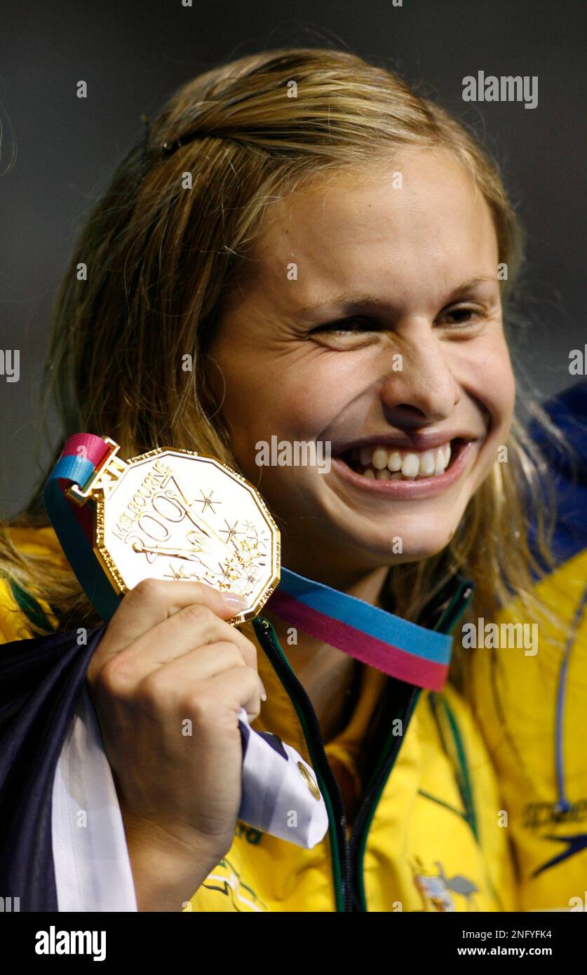 Gold medalist Australia's Libby Lenton celebrates her victory in the ...