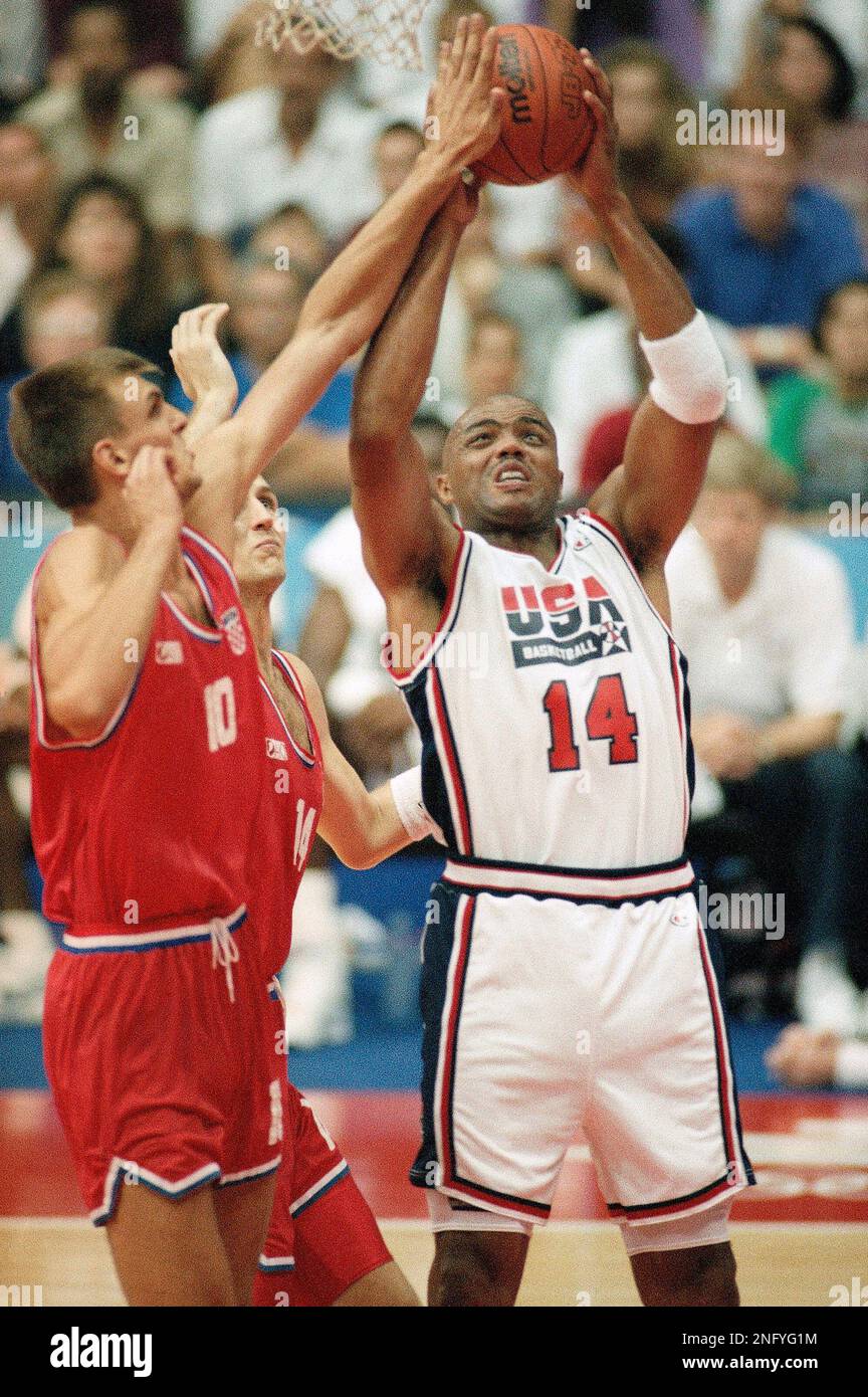 The USA's Charles Barkley (14) goes to the hoop against Croatia's Zan ...