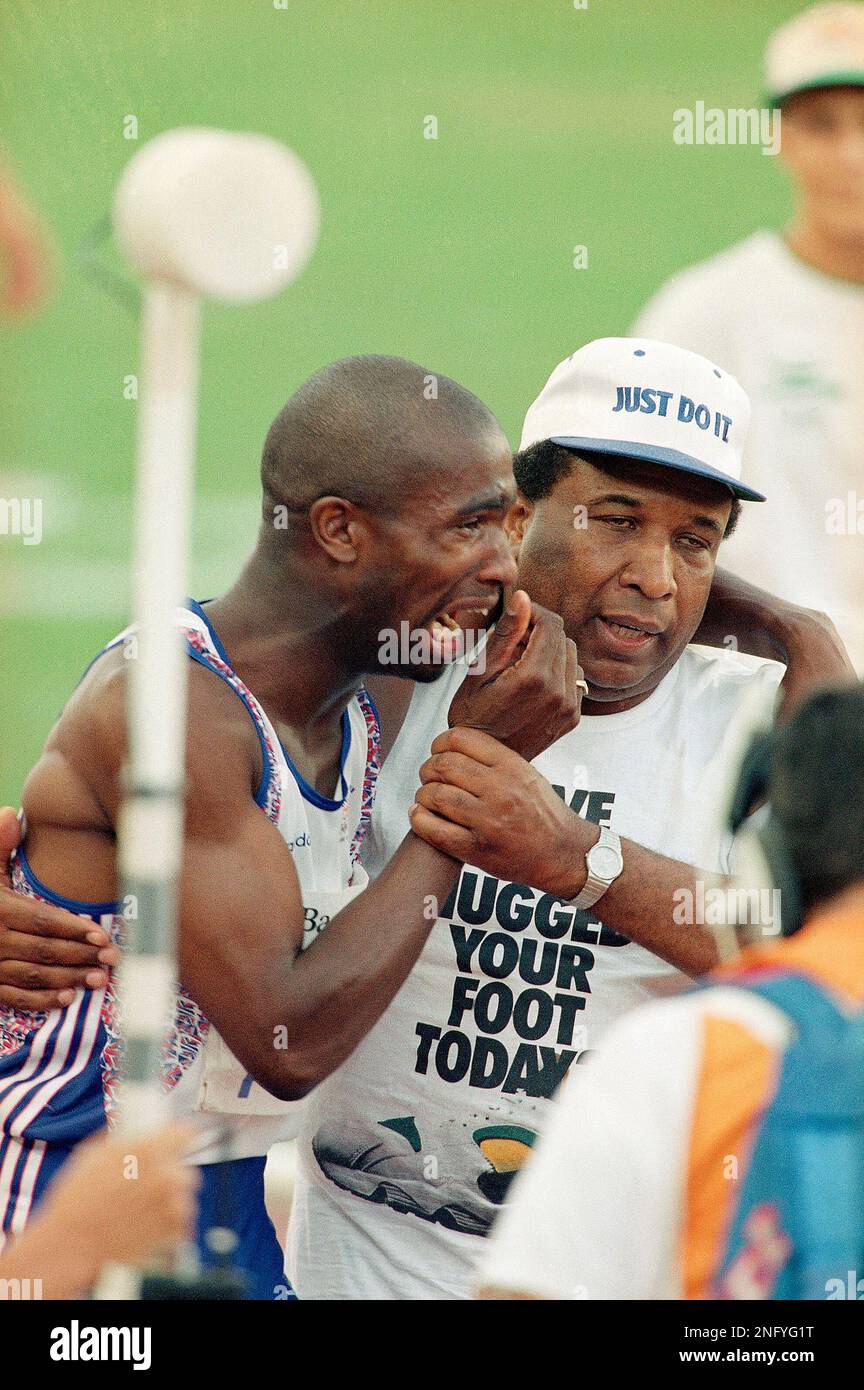 Great Britain Olympic runner Derek Redmond, left cries out in pain ...