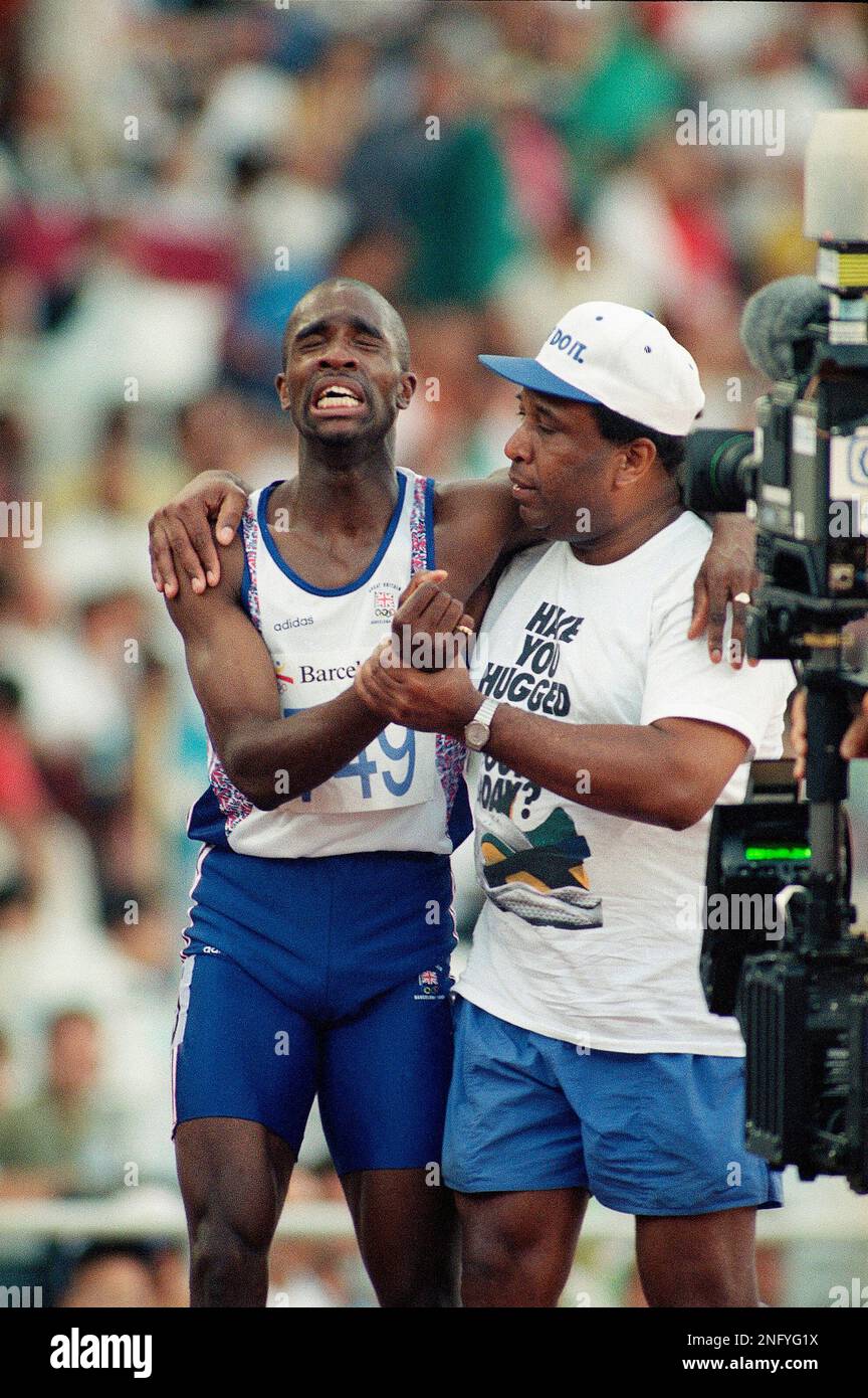 Great Britain Olympic runner Derek Redmond, left cries out in pain ...