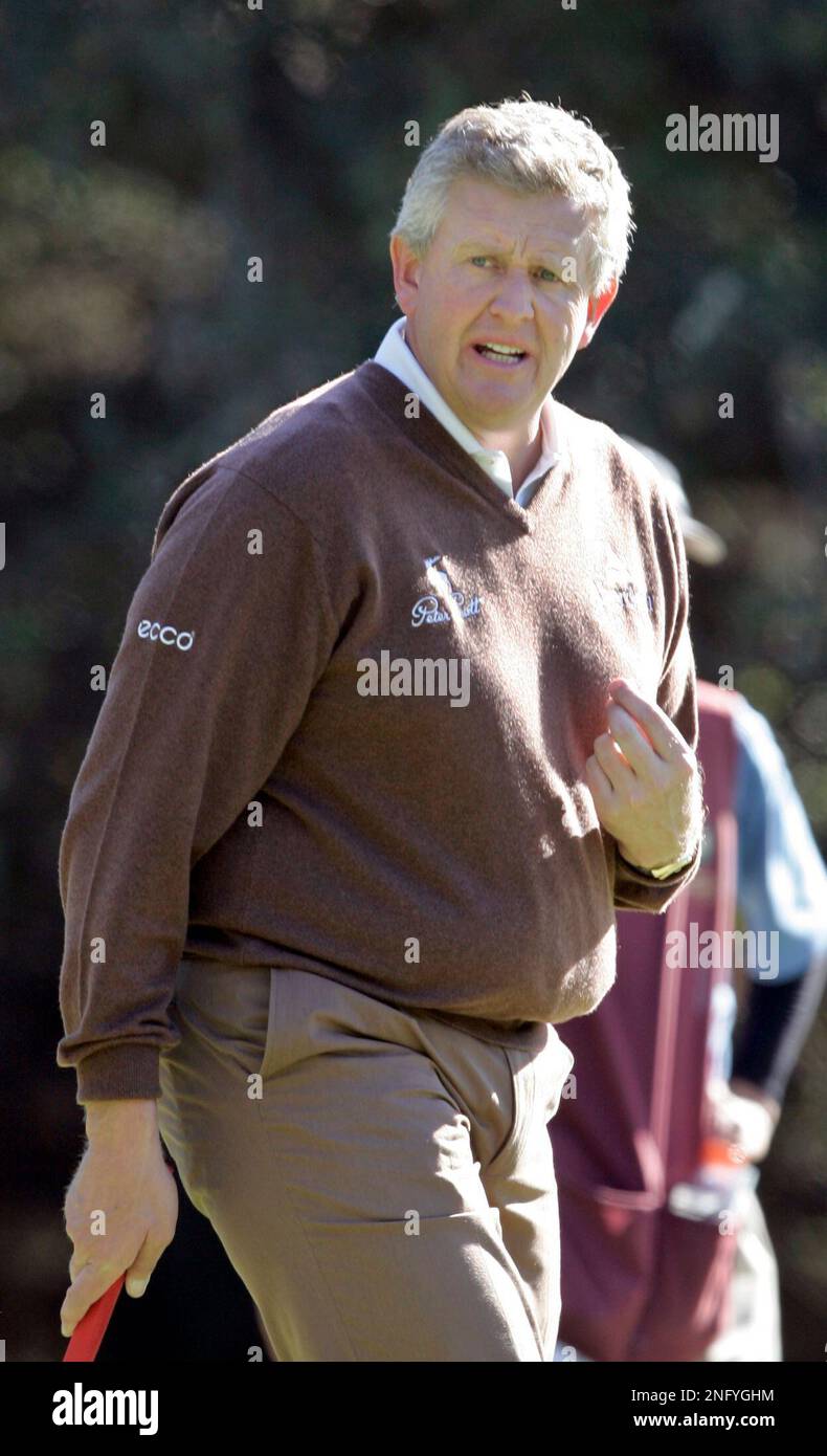 Colin Montgomerie of Scotland walks the ninth green in the Pro-Am round ...
