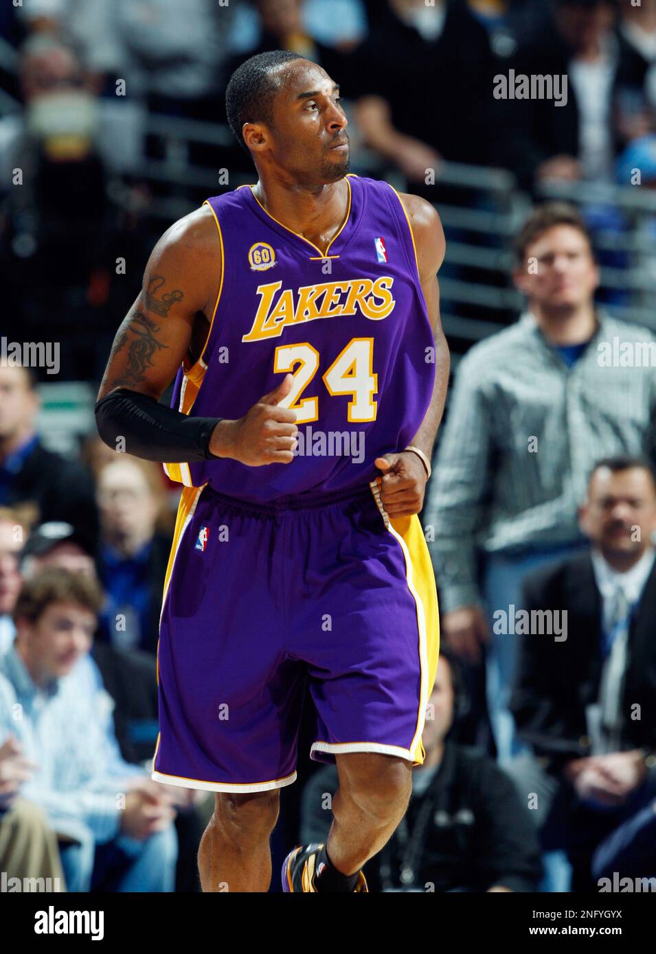 Los Angeles Lakers guard Kobe Bryant reacts after hitting a shot ...