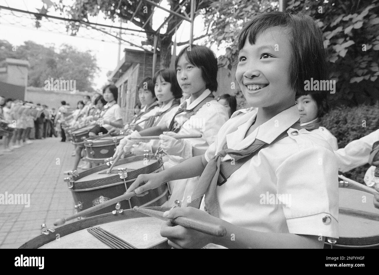 Smiling drummer girls, all members of the Communist Party controlled ...