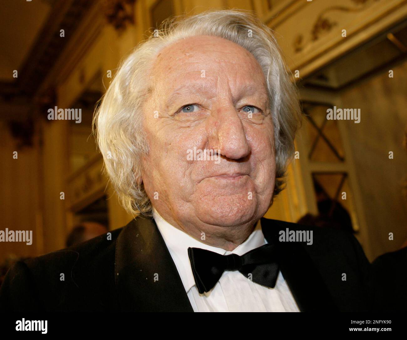 Italian cartoonist Giorgio Forattini arrives at La Scala's theater in ...