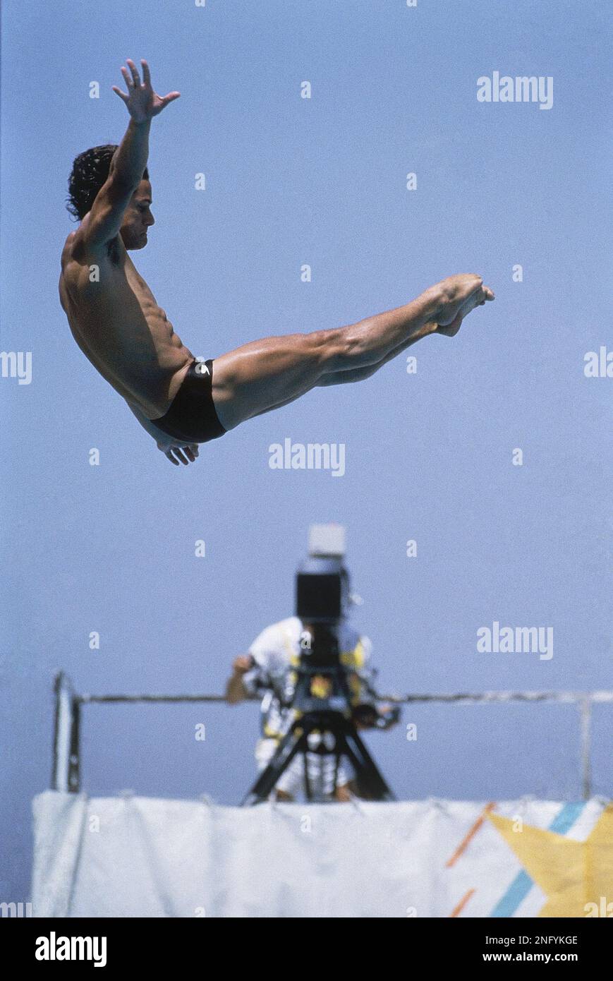 Greg Louganis dives during the Olympic springboard preliminaries, Aug ...
