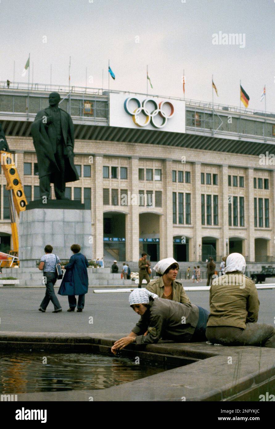 Seen here are Russian women at the exterior of Lenin Stadium with a ...