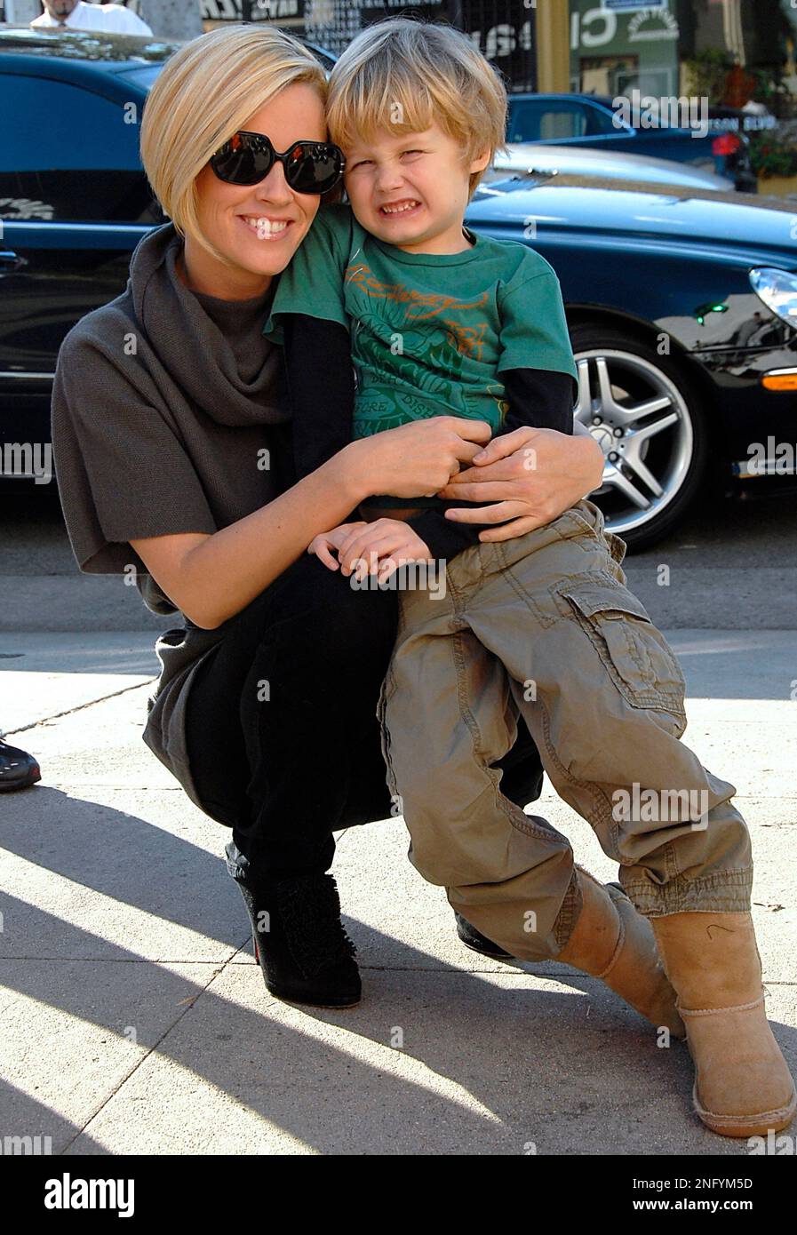 Actress Jenny McCarthy, left, and her son Evan Asher, right, pose at ...