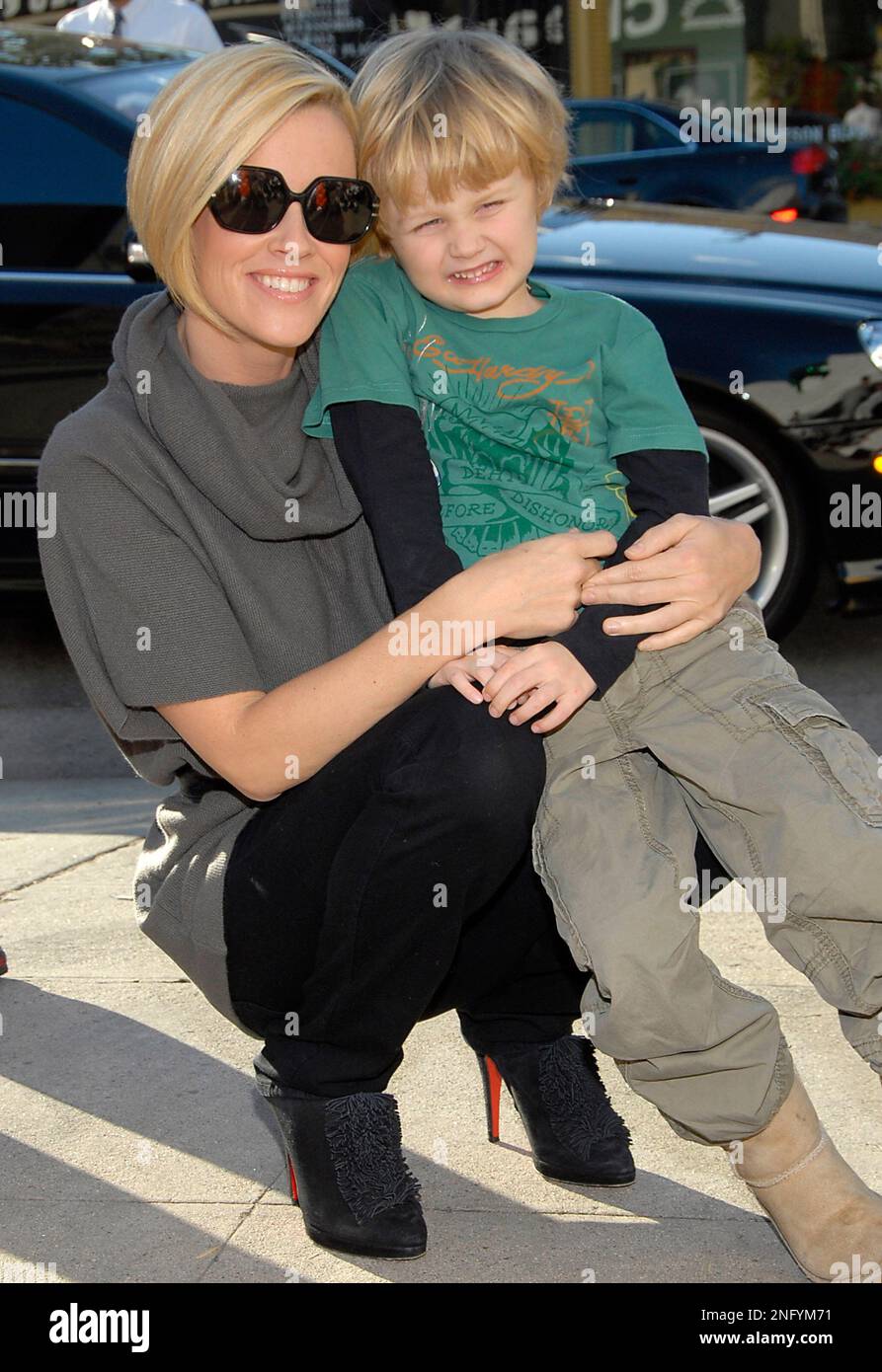 Actress Jenny McCarthy, left, and her son Evan Asher, right, pose at ...